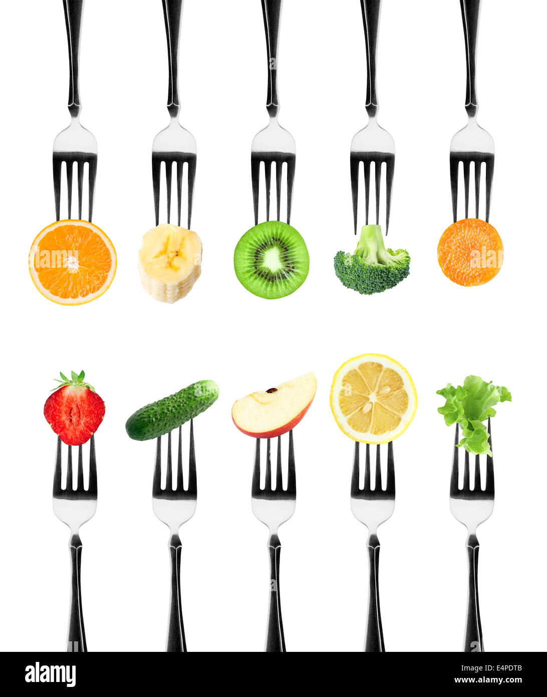 Fruits and vegetables on the forks. Healthy food Stock Photo - Alamy