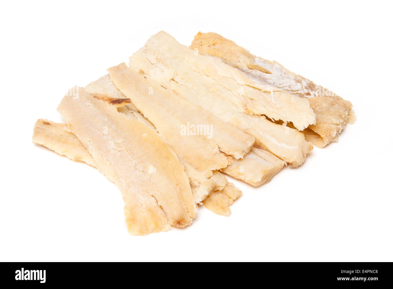 Pieces of salt cod fish isolated on a white studio background Stock ...