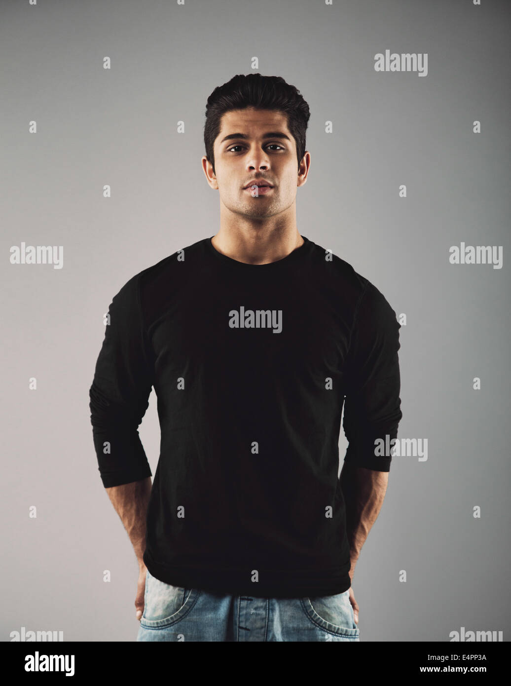 Portrait of handsome young hispanic guy posing. Smart male fashion ...