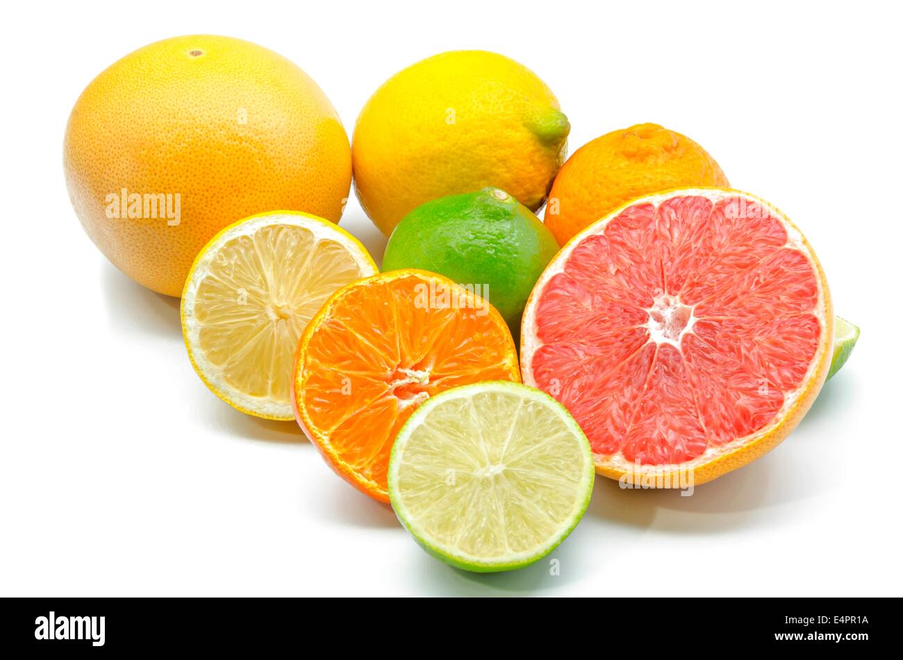Assortment of citrus on white background Stock Photo - Alamy