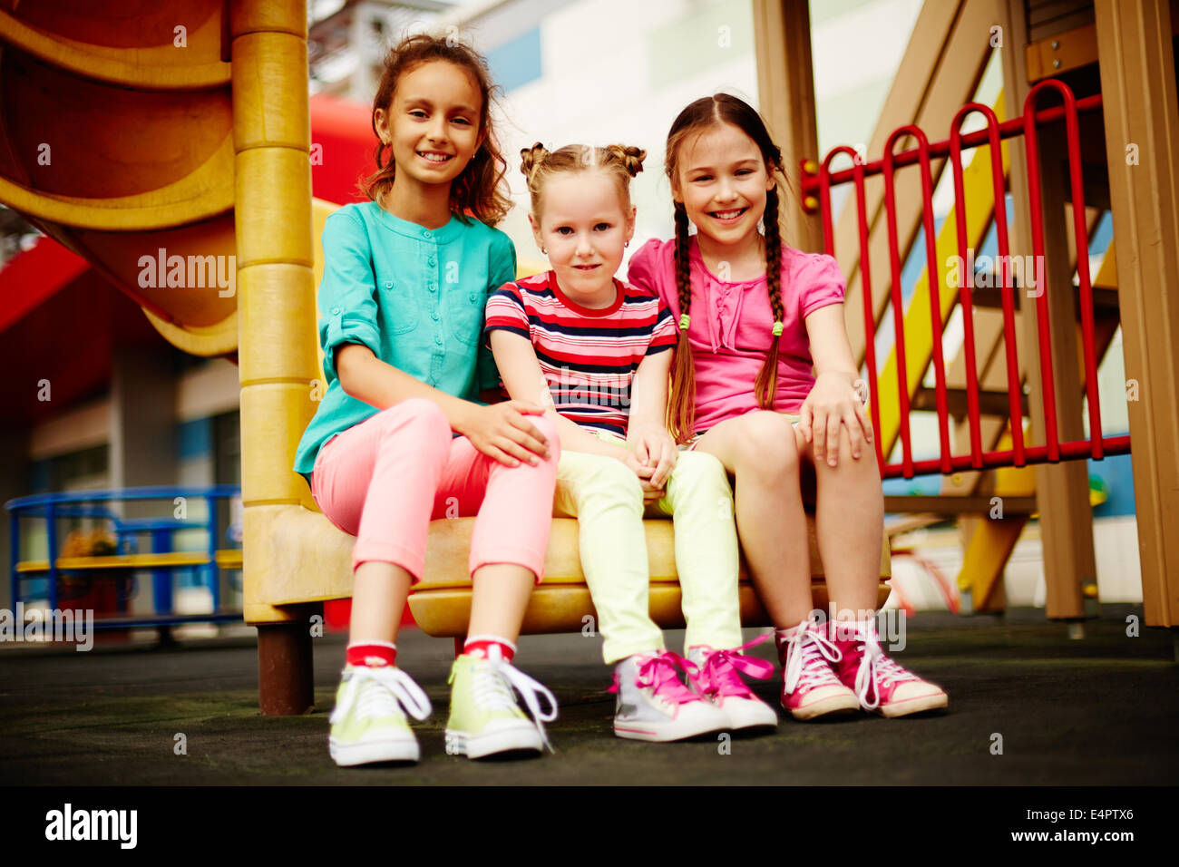 Image of cute girls spending time on playground outdoors Stock Photo ...