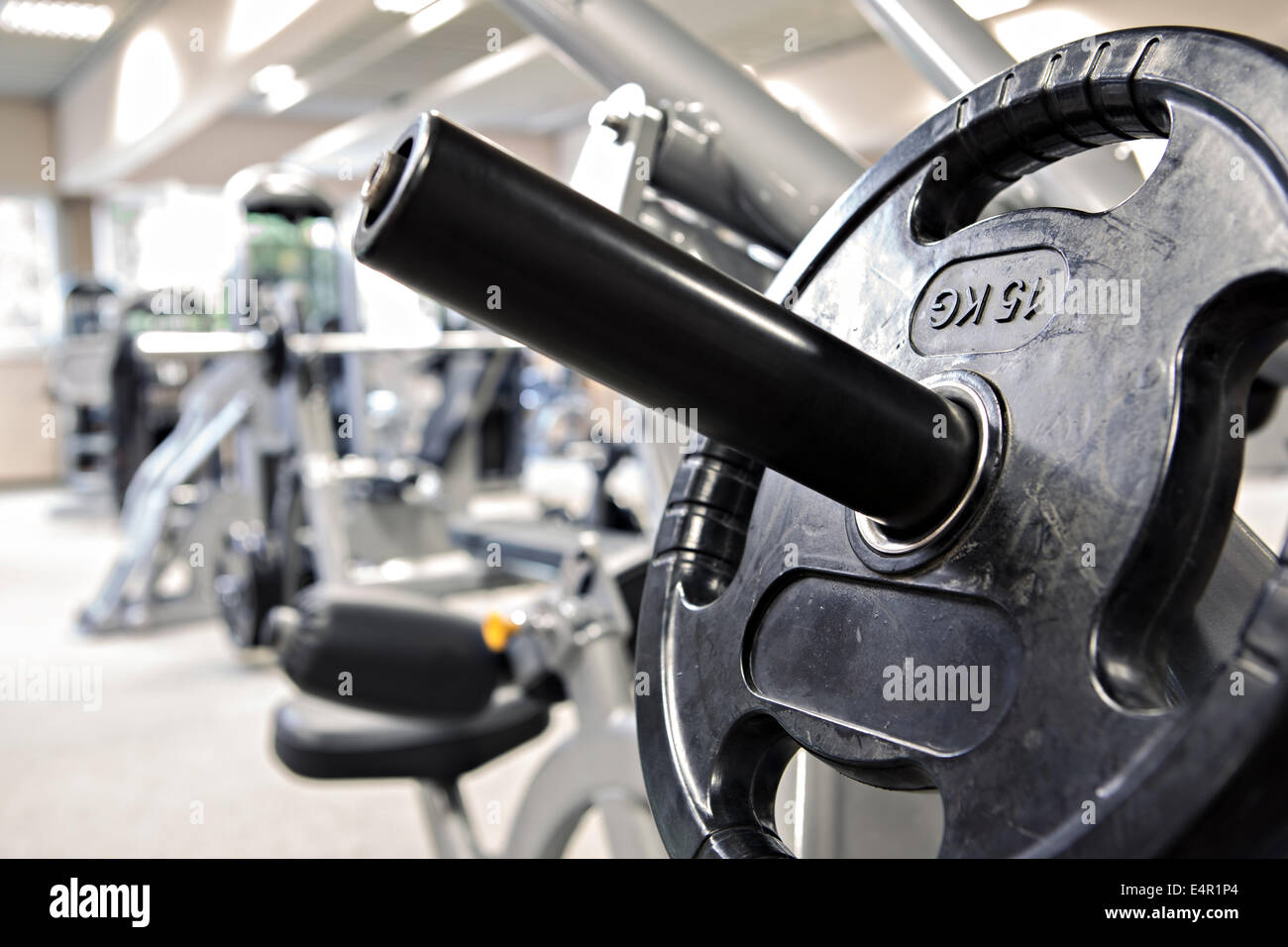 diverse equipment and machines at the gym room Stock Photo - Alamy