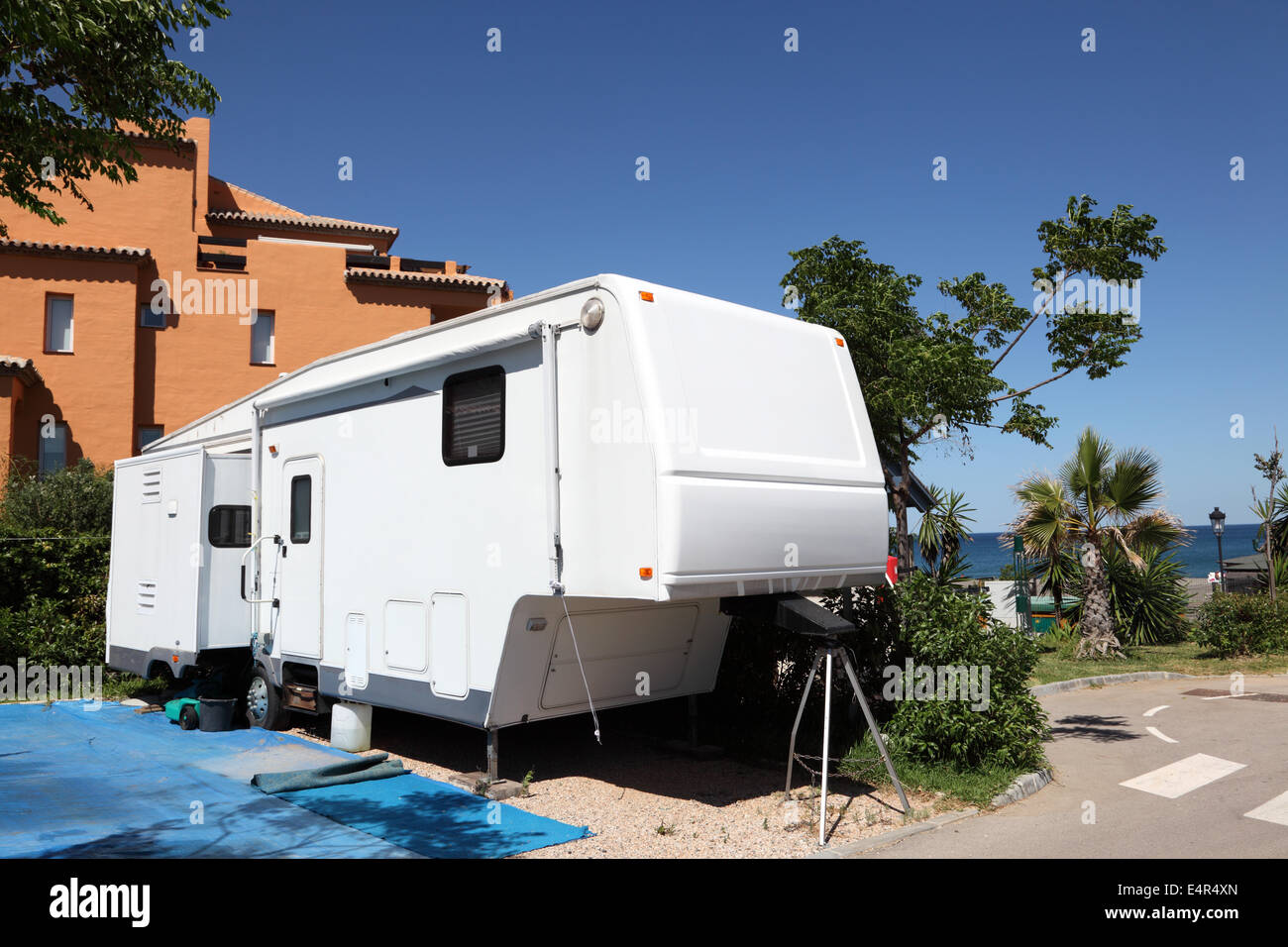 Caravan on a camping site in Spain Stock Photo - Alamy