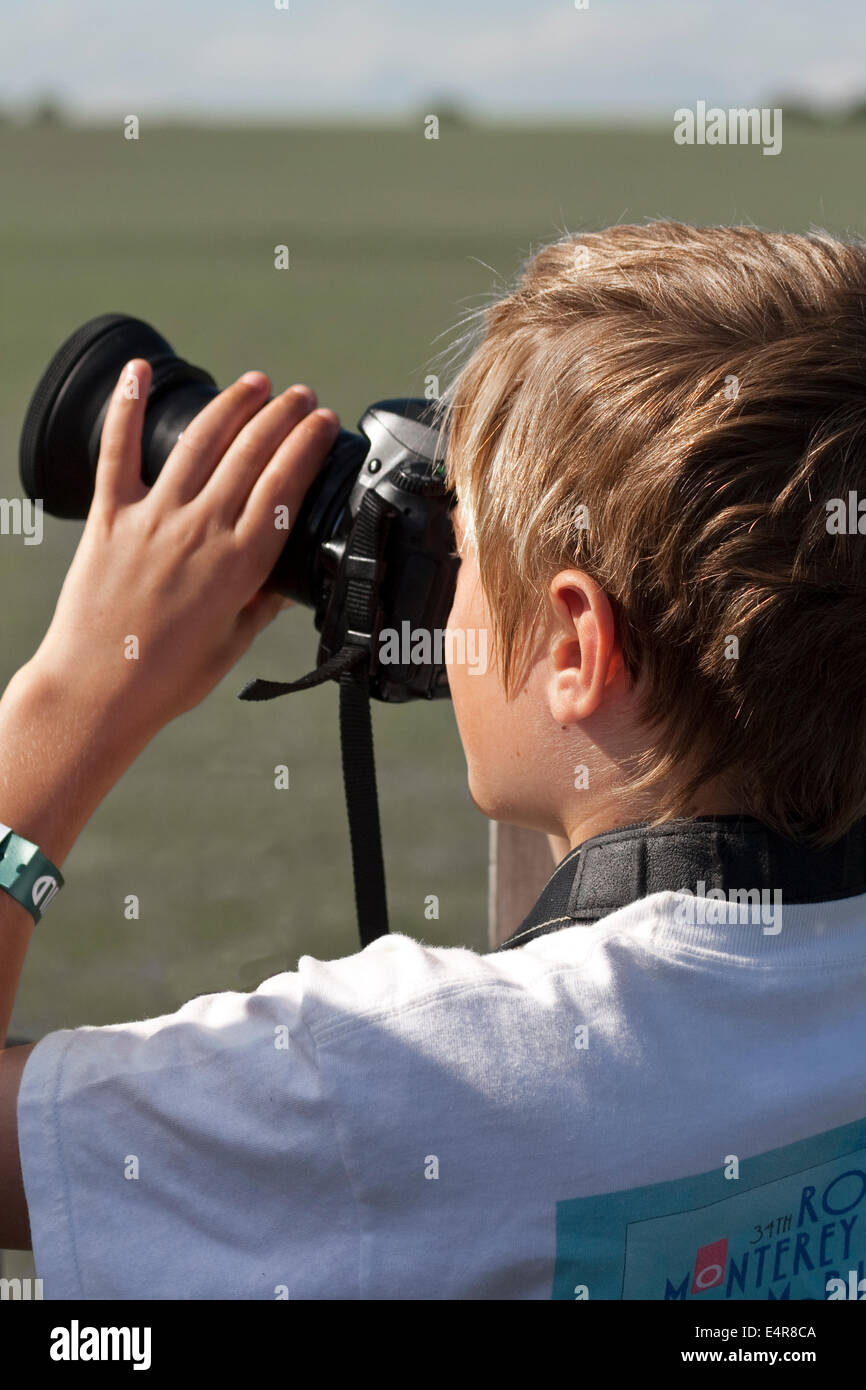 Boy with camera Stock Photo - Alamy