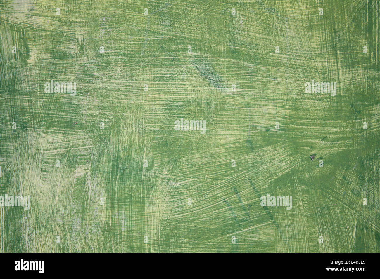 Wood plank painted with a green textured wash background Stock Photo ...