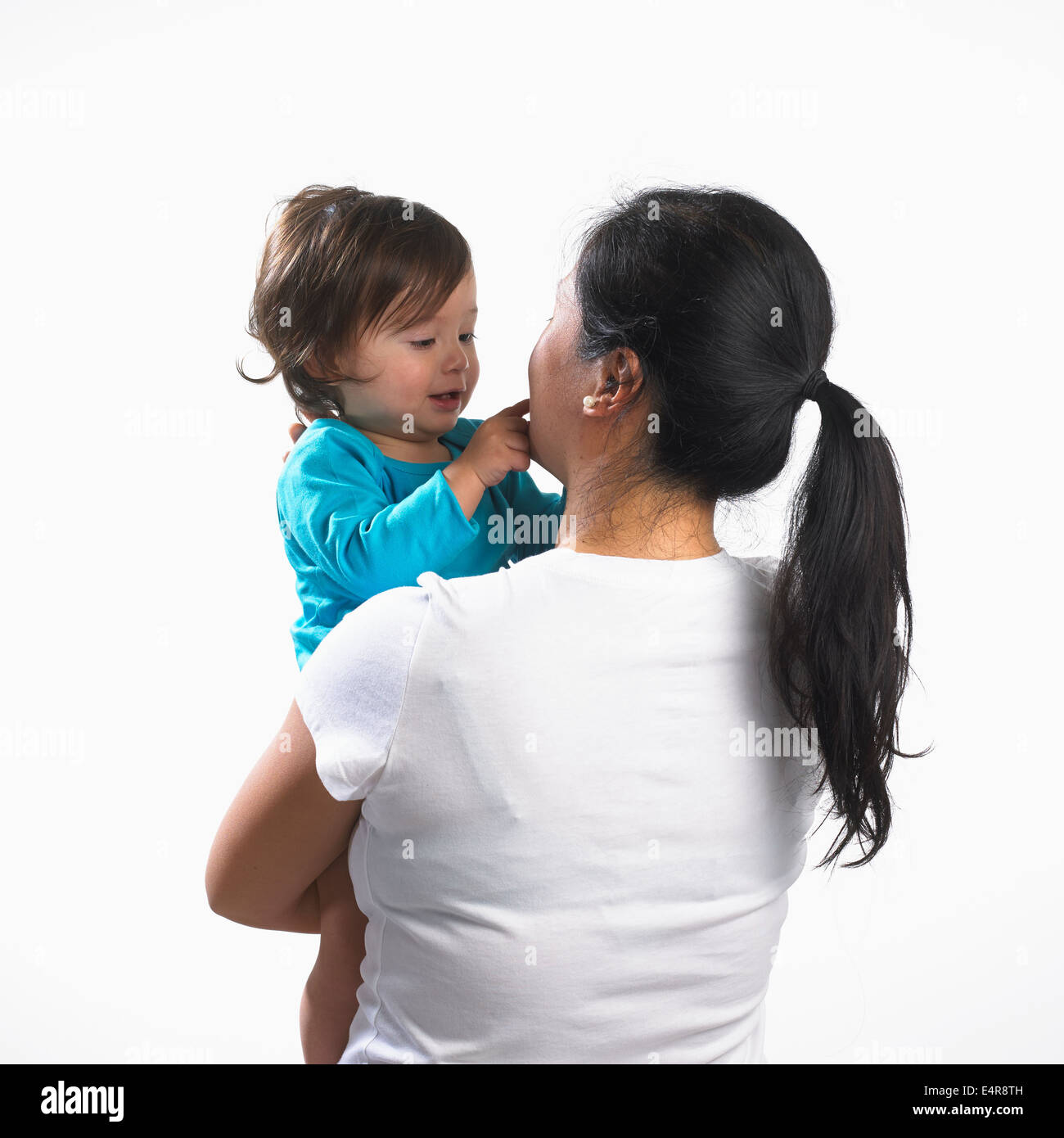 Holding baby in arms hi-res stock photography and images - Alamy