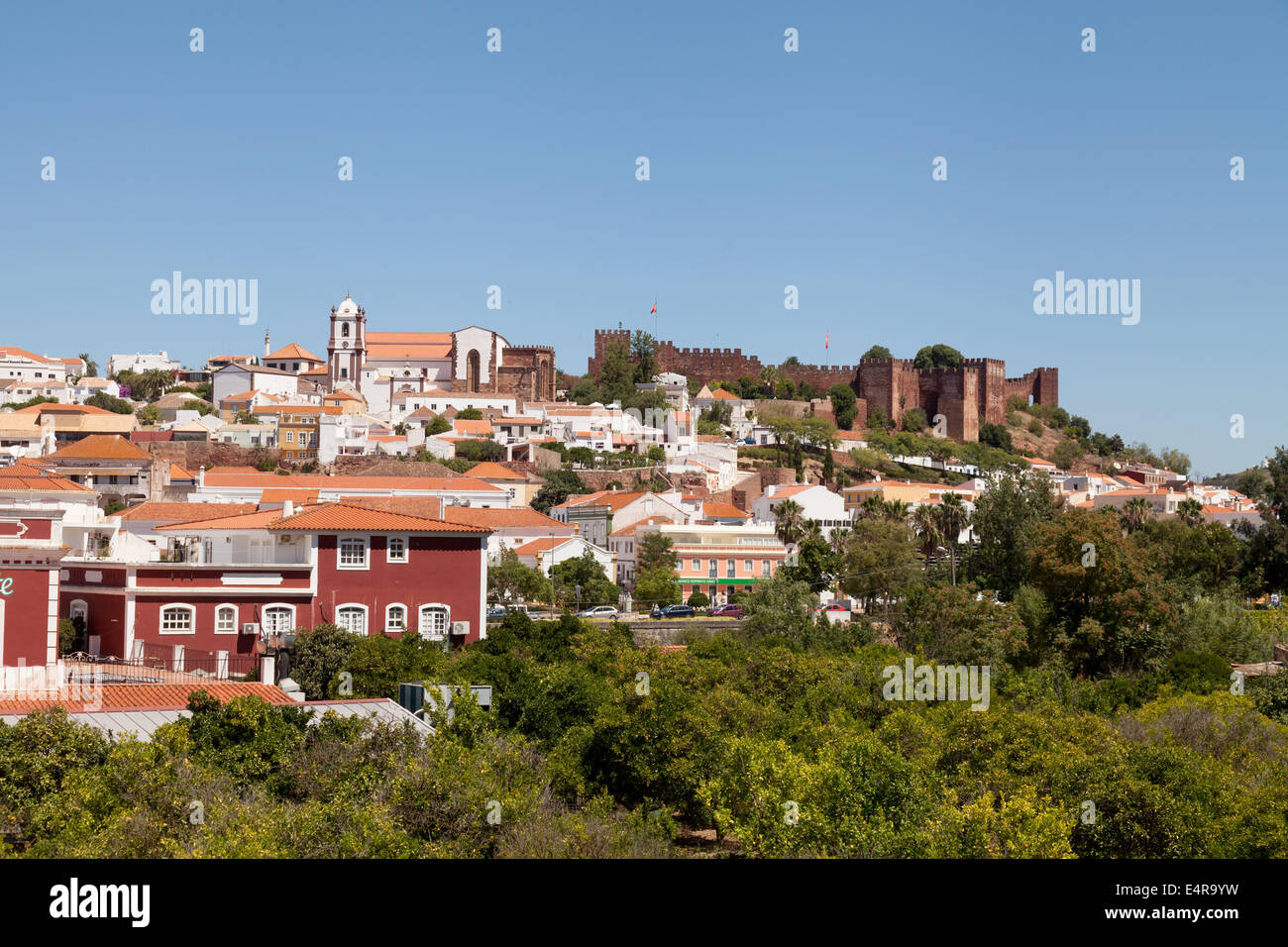 Skyline view of the town of Silves with moorish castle and cathedral ...