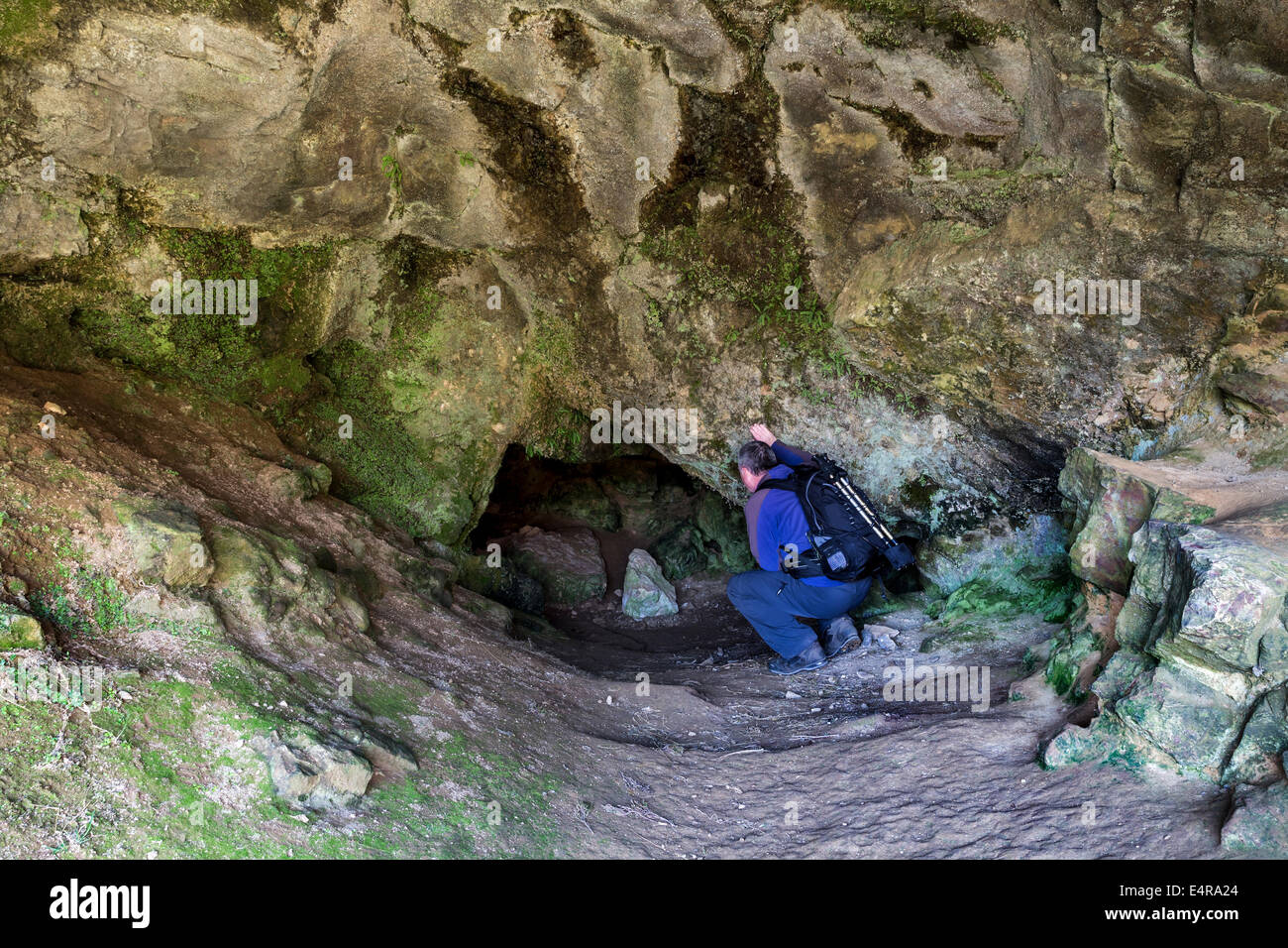 Walker Inside the Inchnadamph Bone Caves on the Lower slopes of Beinn ...
