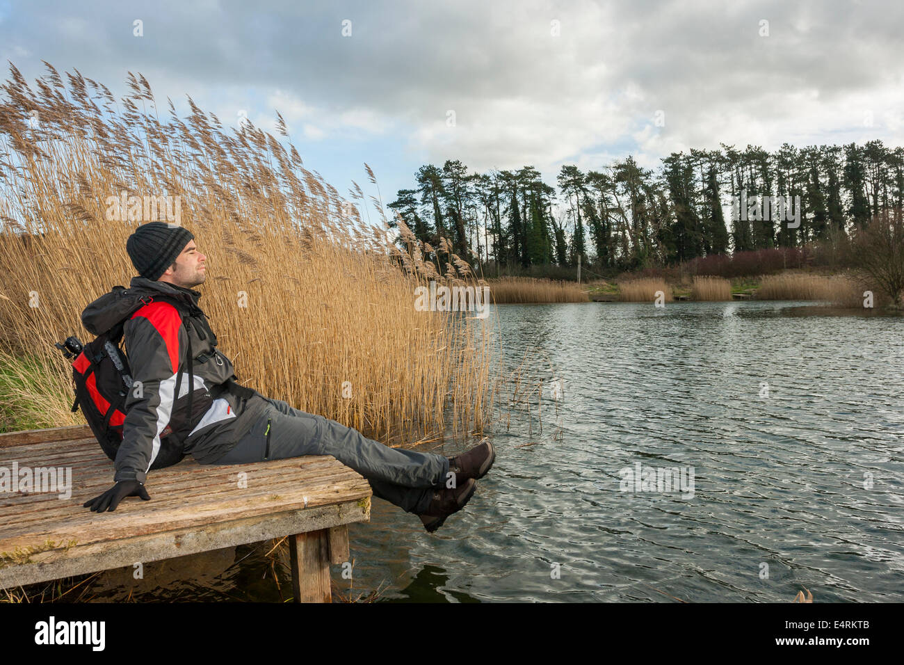 Young adult relaxing in nature Stock Photo - Alamy