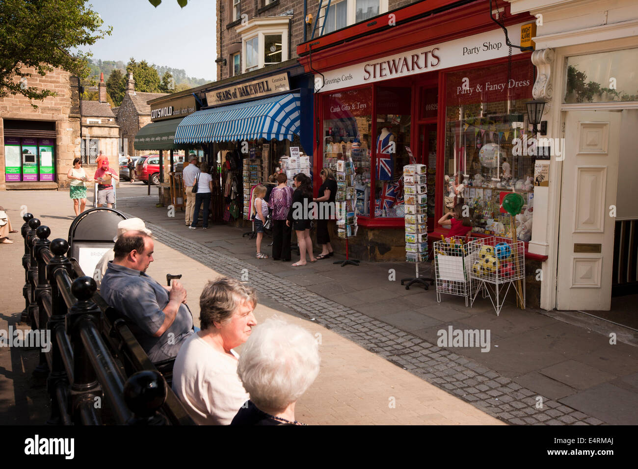 UK, Derbyshire, Peak District, Bakewell, Bridge Street, row of small ...