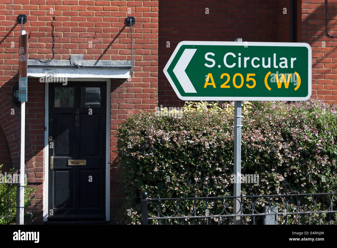 sign for the south circular, or A205, road adjacent to a house front ...