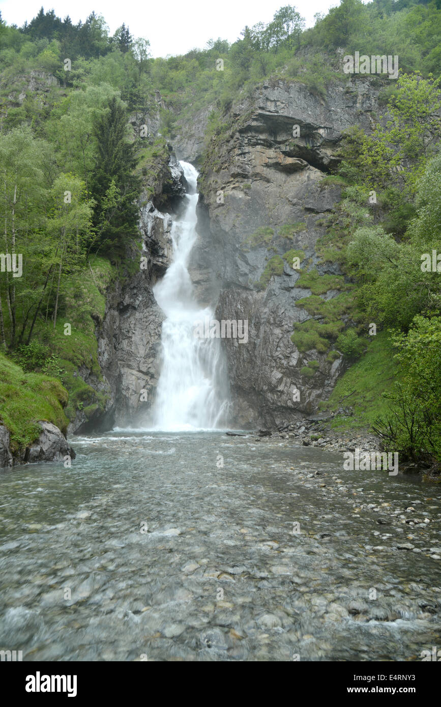 Waterfall splashes into a pool Stock Photo - Alamy