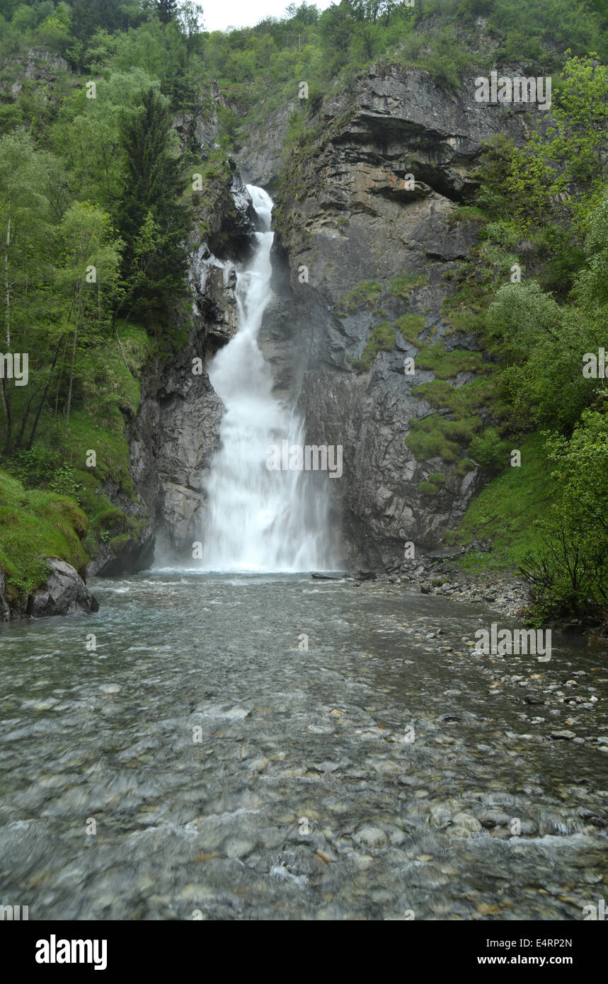 Waterfall splashes into a pool Stock Photo - Alamy