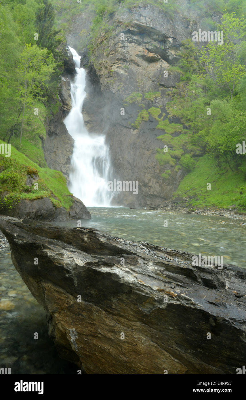 Waterfall splashes into a pool Stock Photo - Alamy
