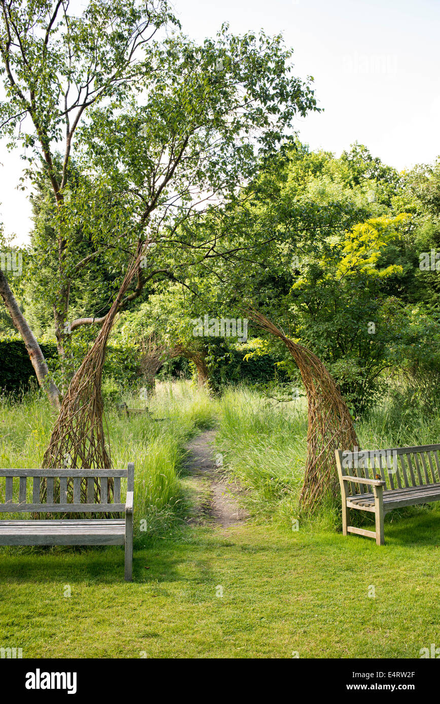 Willow Archway over garden path at RHS Harlow Carr. Harrogate, England ...