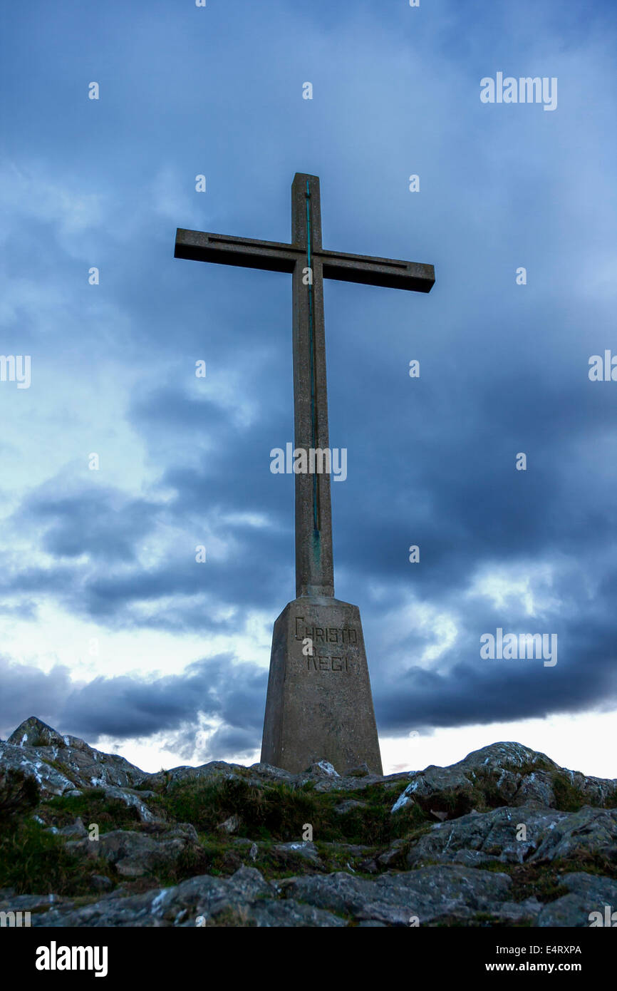 Christian cross silhouette on the top of the mountain. Bray, Ireland ...