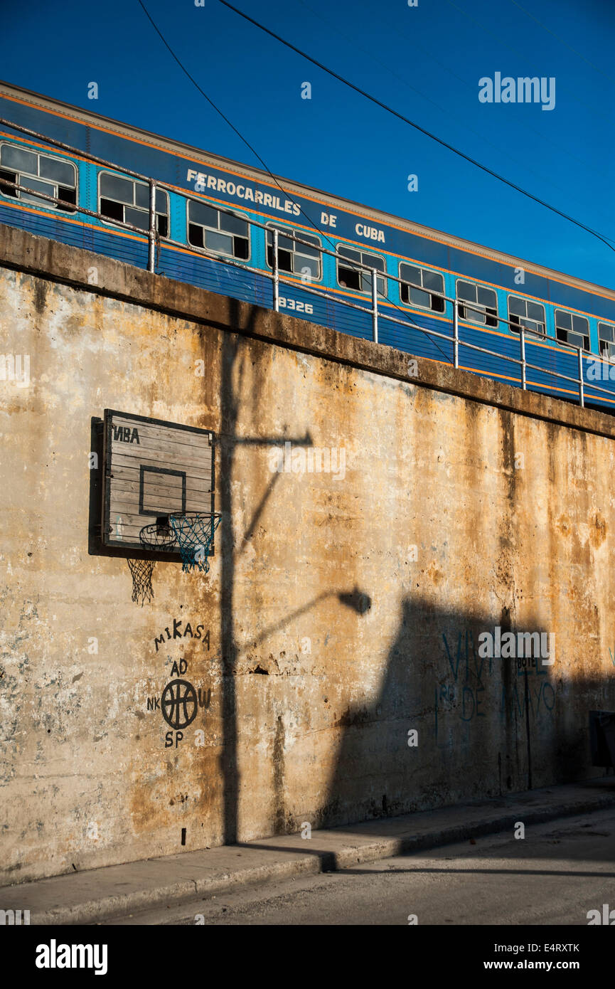Basketball goal and train on railroad tracks Stock Photo - Alamy