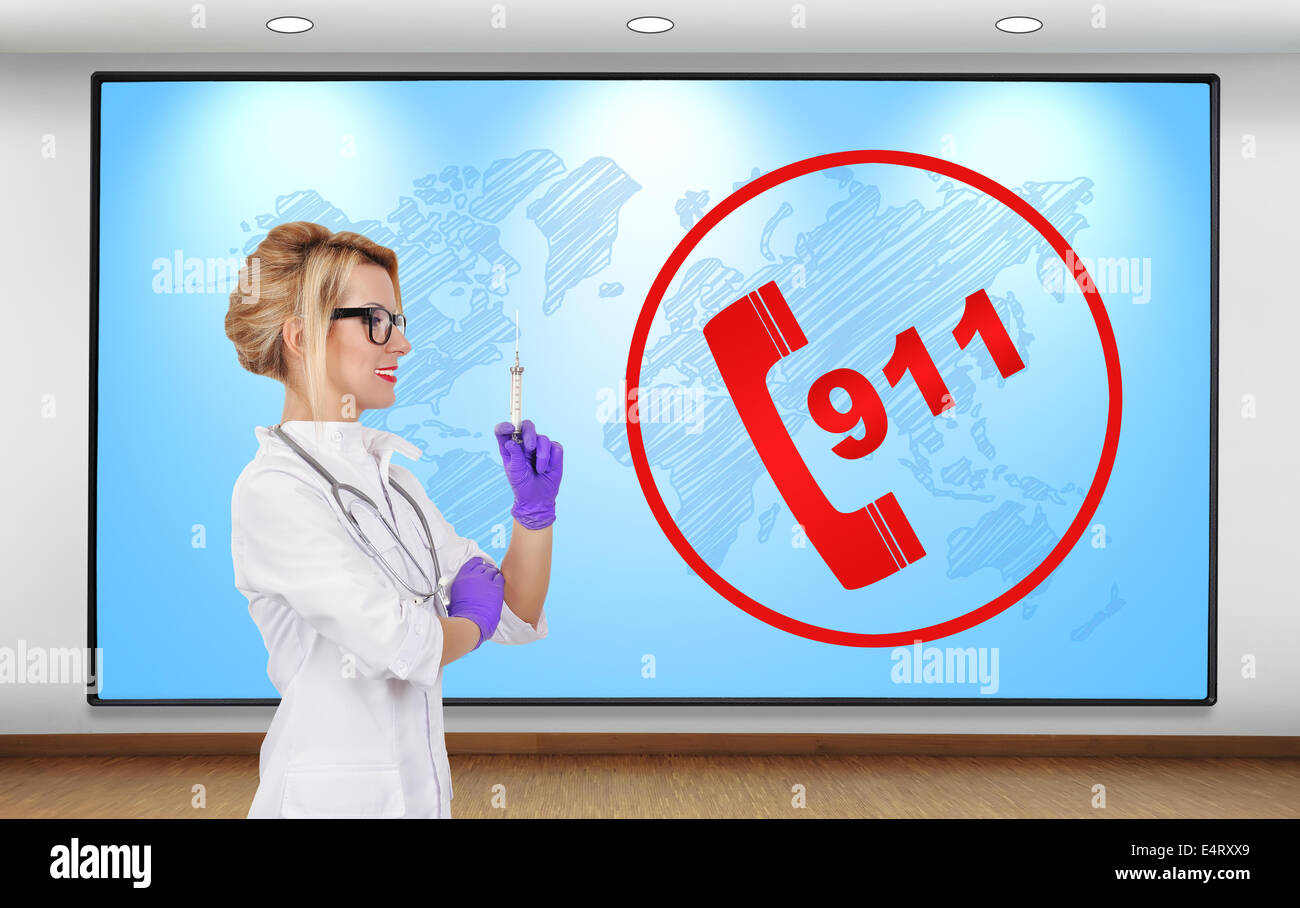 female doctor with syringe and 911 symbol on plasma panel Stock Photo ...
