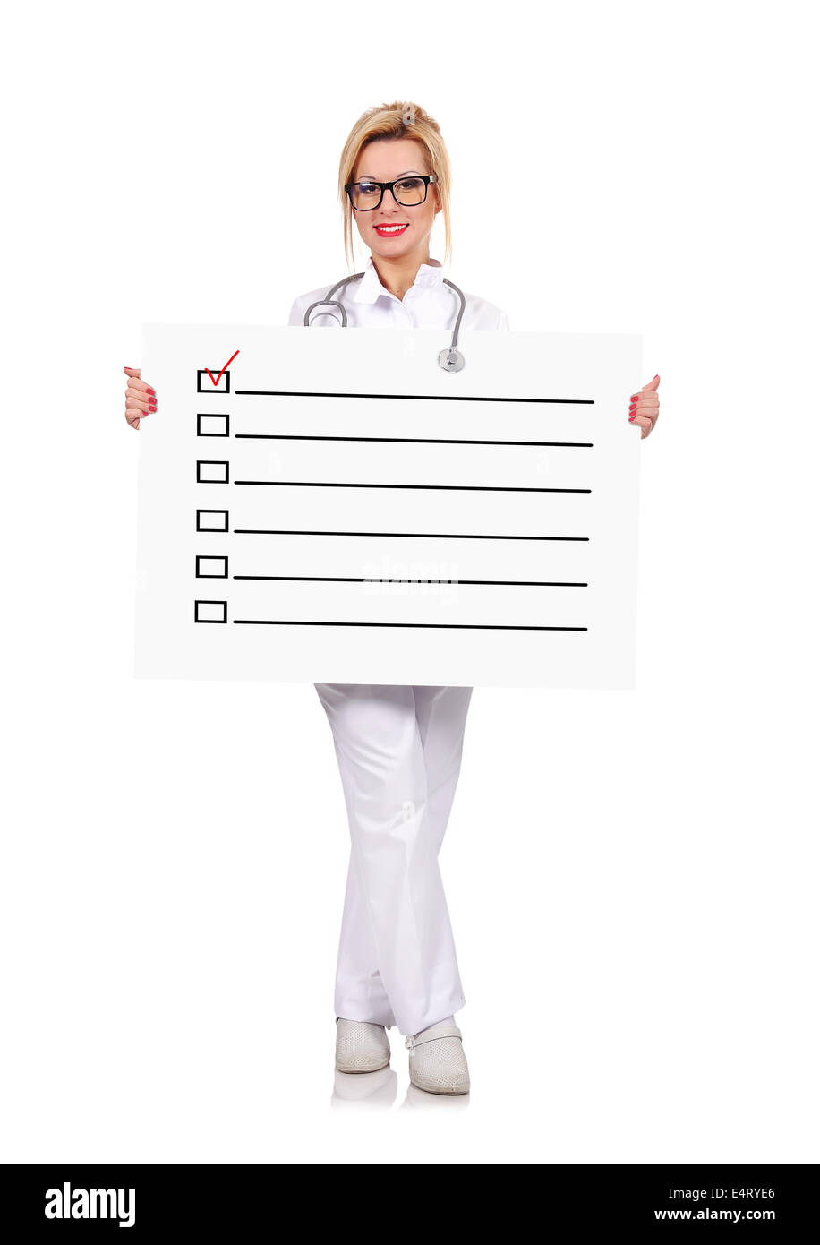 female doctor holding big poster with check box Stock Photo - Alamy
