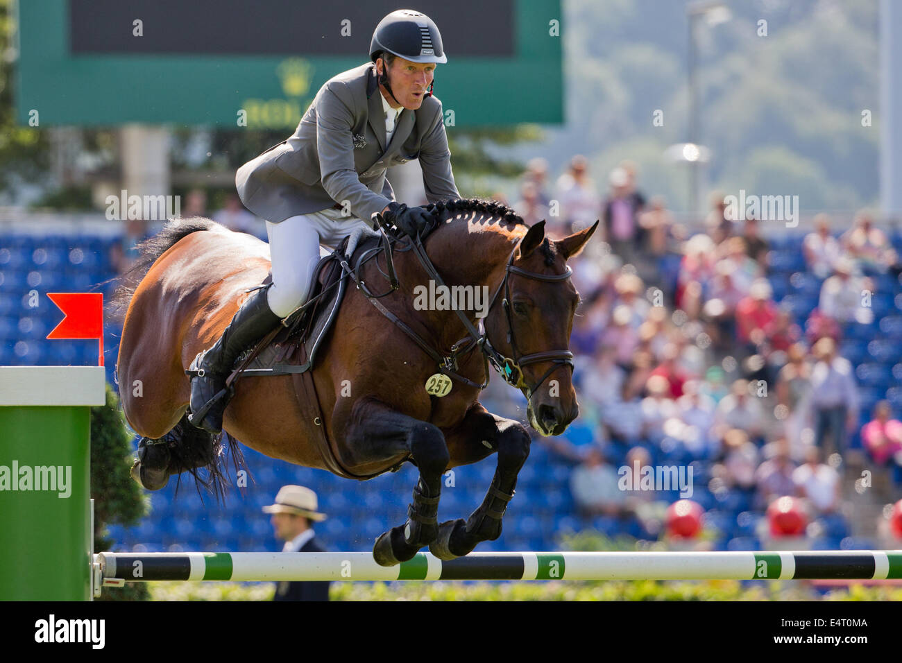 Aachen, Germany. 16th July, 2014. German rider Ludger Beerbaum jumps ...