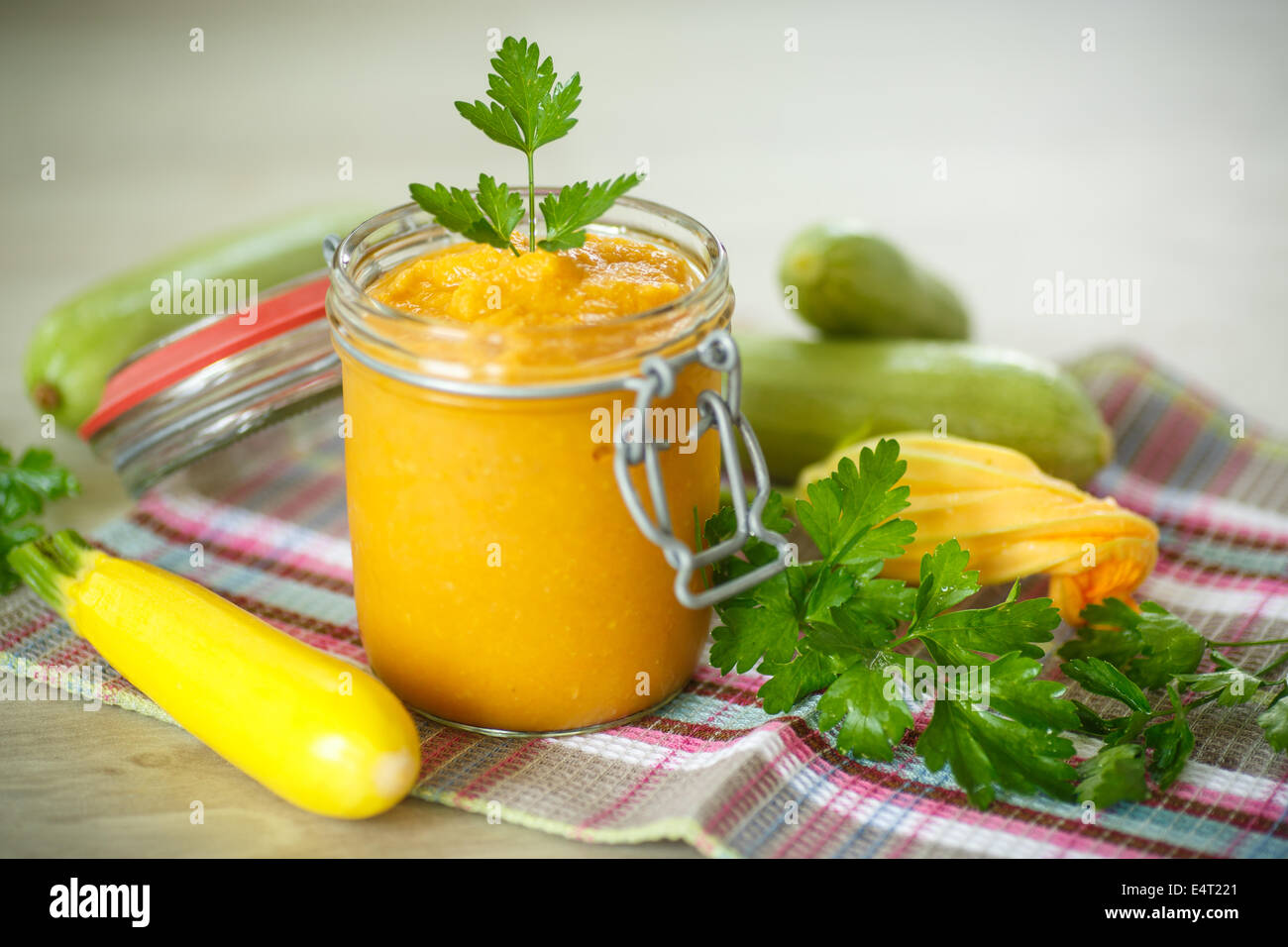 squash puree in a glass jar on the table Stock Photo - Alamy