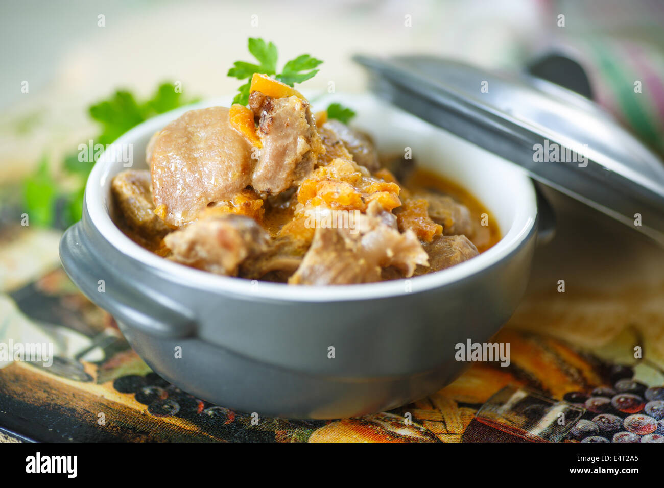 chicken gizzards stewed with vegetables in cream sauce Stock Photo - Alamy