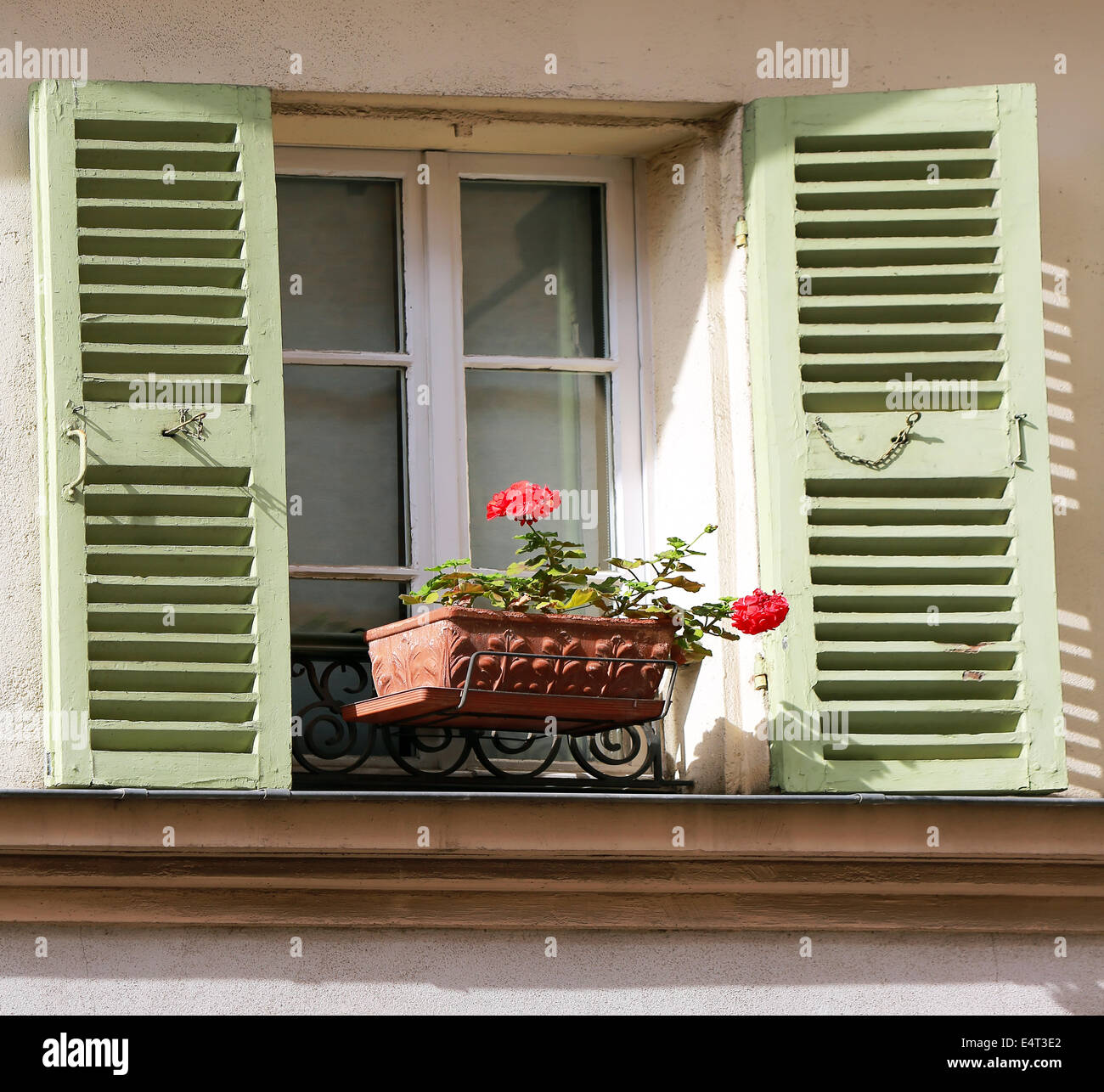 Window with shutters of old buildings on Montmartre, Paris Stock Photo ...
