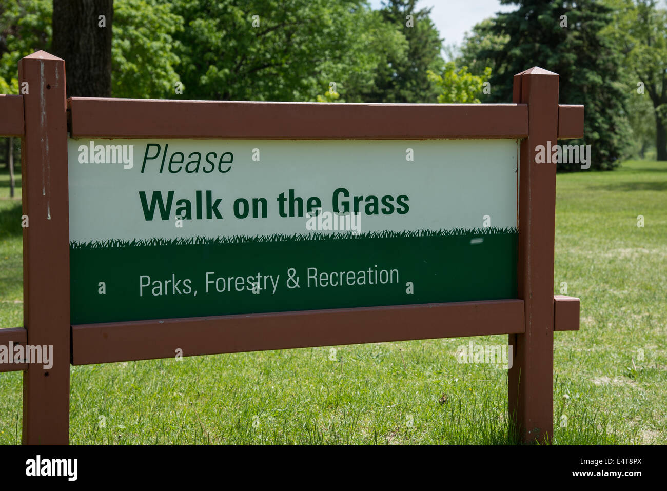 Walk on grass sign hi-res stock photography and images - Alamy