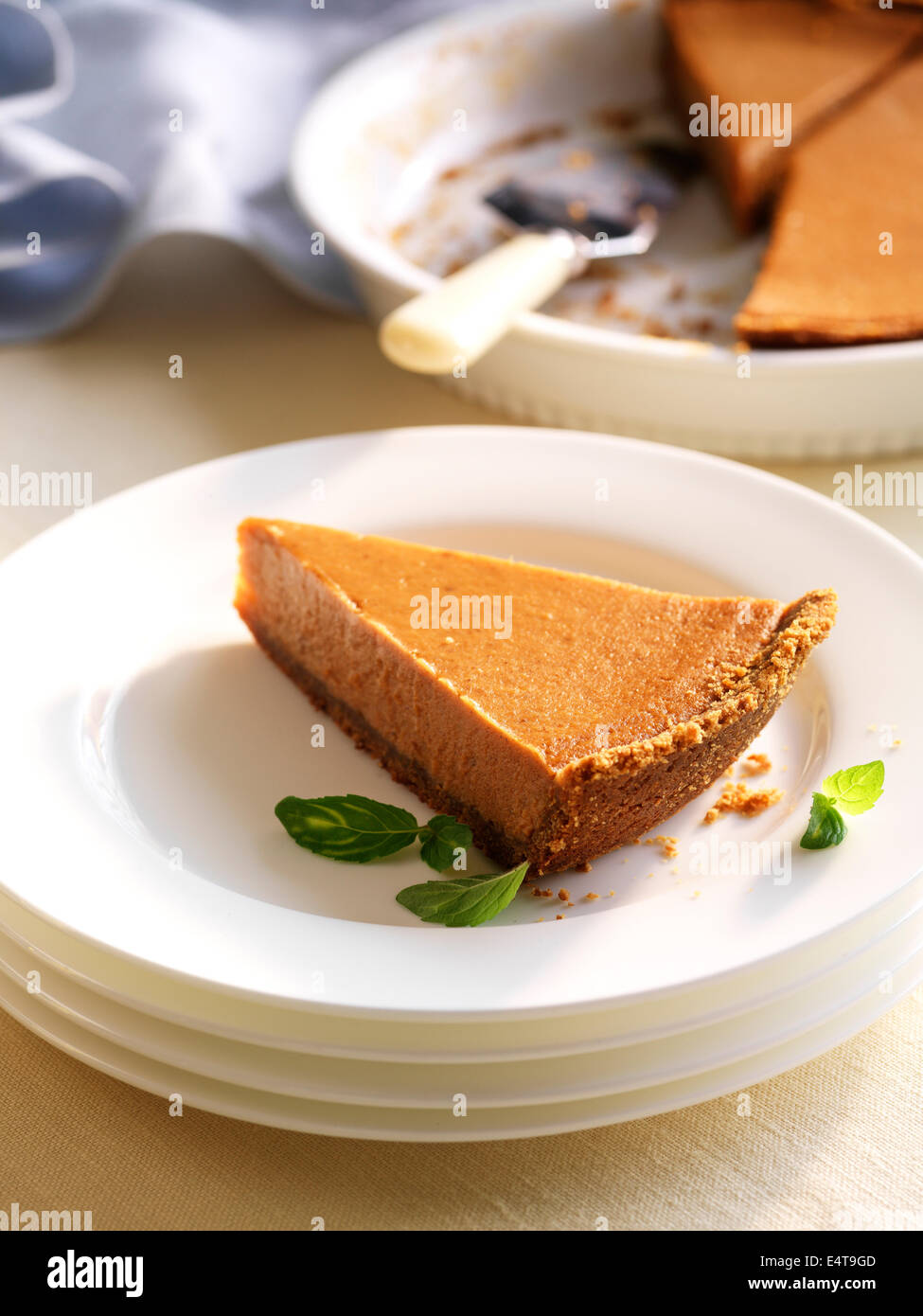 Pumpkin Pie on Stacked Plates, Studio Shot Stock Photo - Alamy