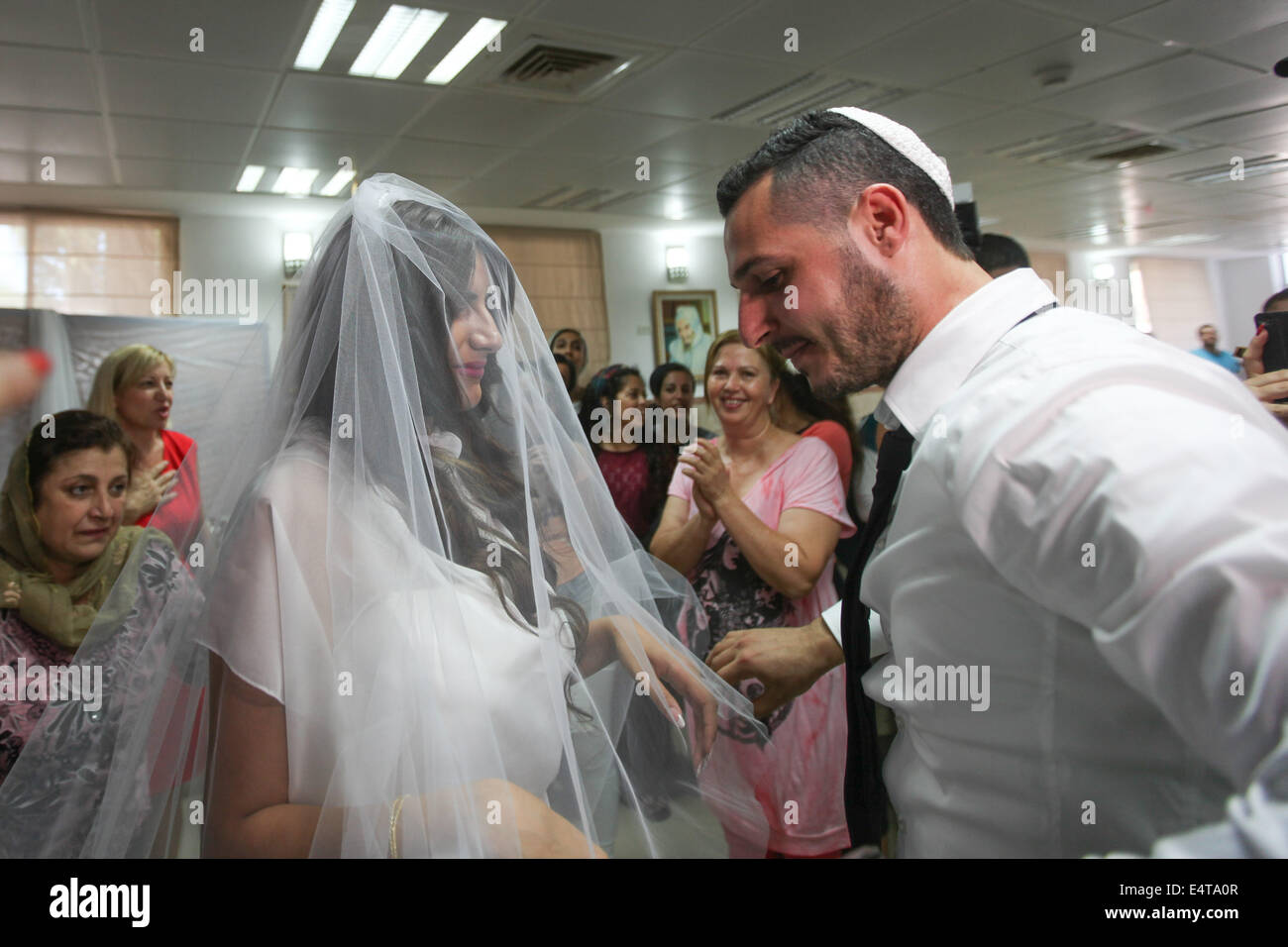 Sderot, Israel. 16th July, 2014. Israeli bride Zohar and her groom Haim ...