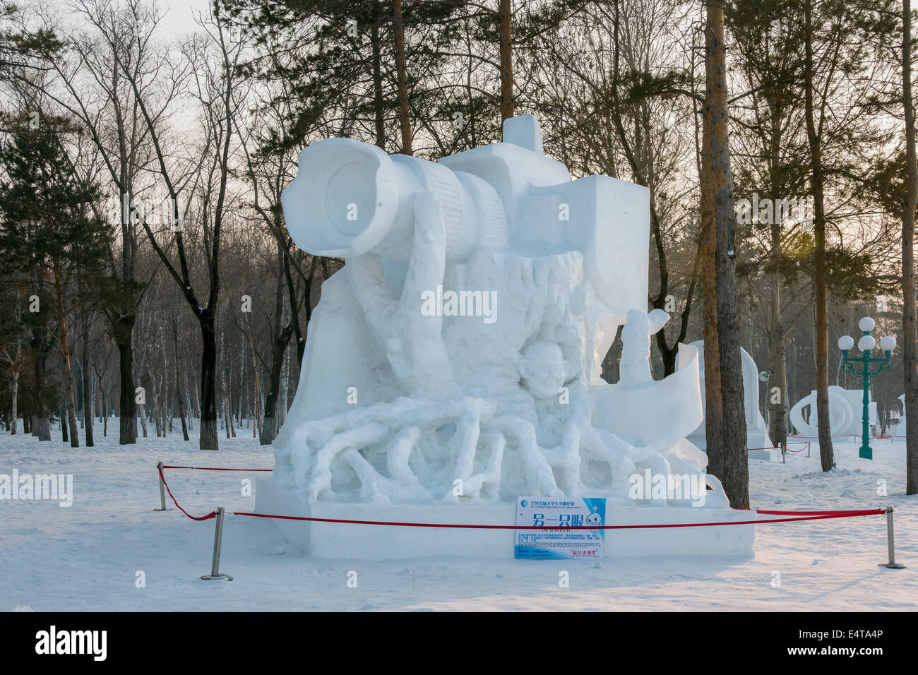 Snow sculpture 'The Other Eye' at sunset, Harbin Snow Festival, China ...