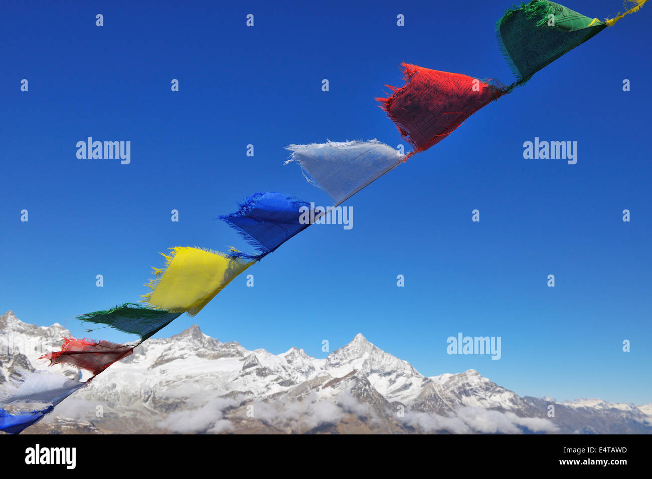 Prayer flag blowing in breeze hi-res stock photography and images - Alamy