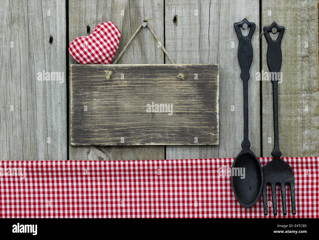 Blank rustic sign with red checkered (gingham) heart and tablecloth ...