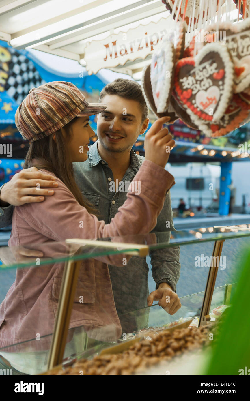 Young couple having fun at amusement park, Germany Stock Photo - Alamy