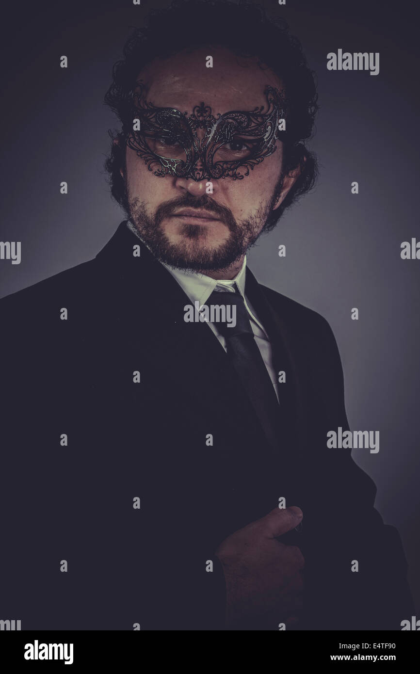 Handsome, Portrait of elegant businessman, mysterious venetian mask ...
