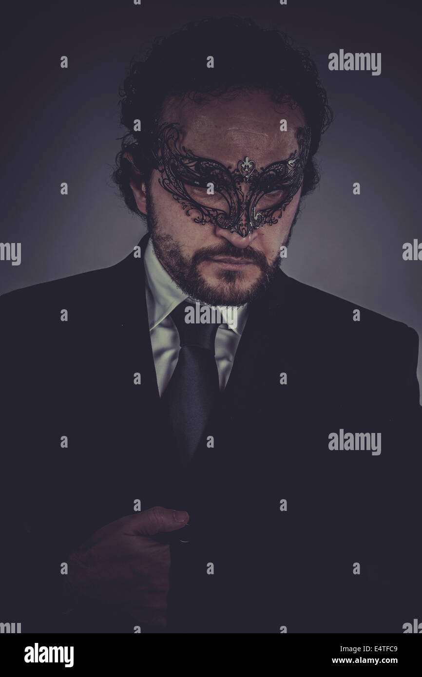 Portrait of elegant businessman, mysterious venetian mask Stock Photo ...