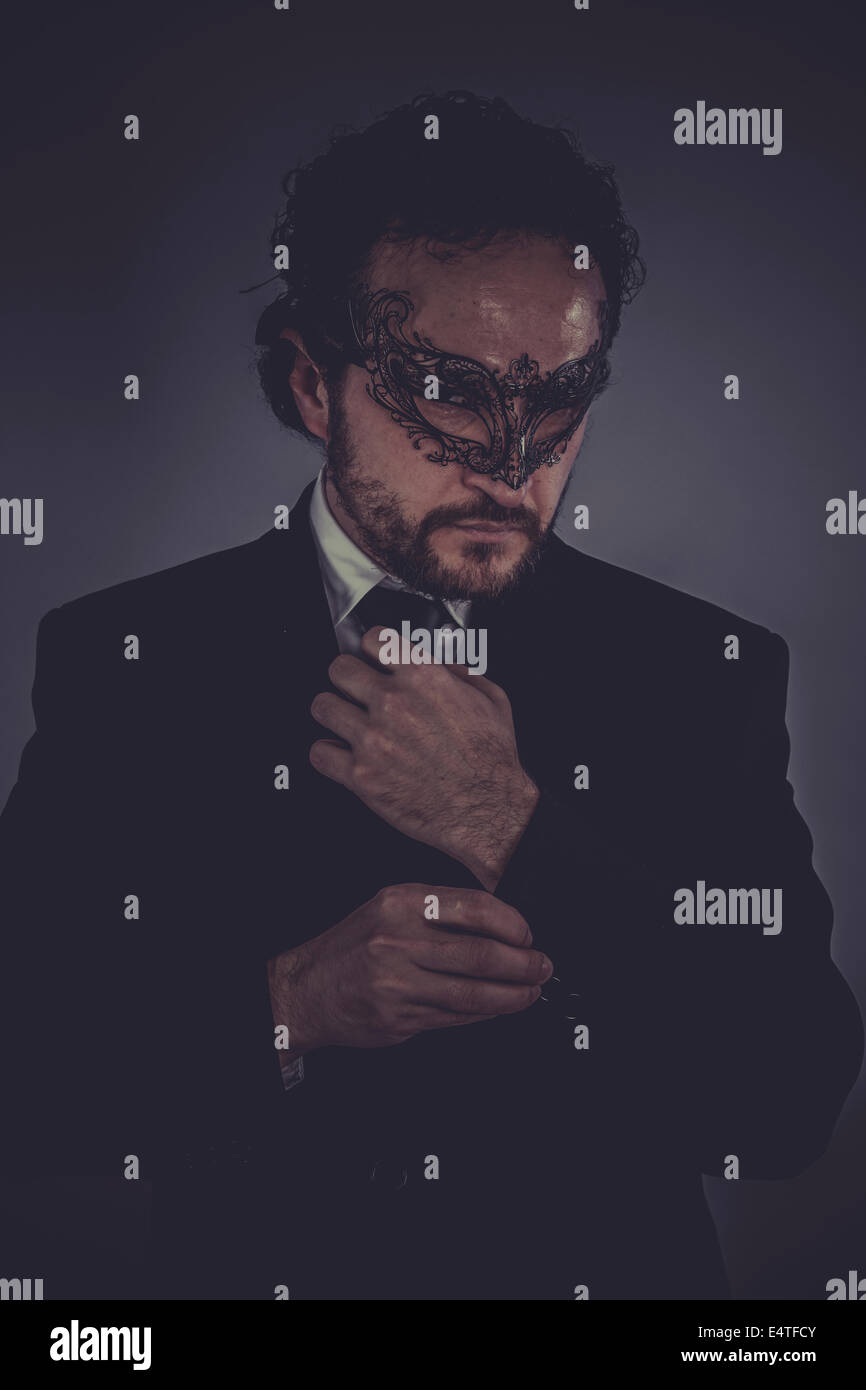 Boss, Portrait of elegant businessman, mysterious venetian mask Stock ...