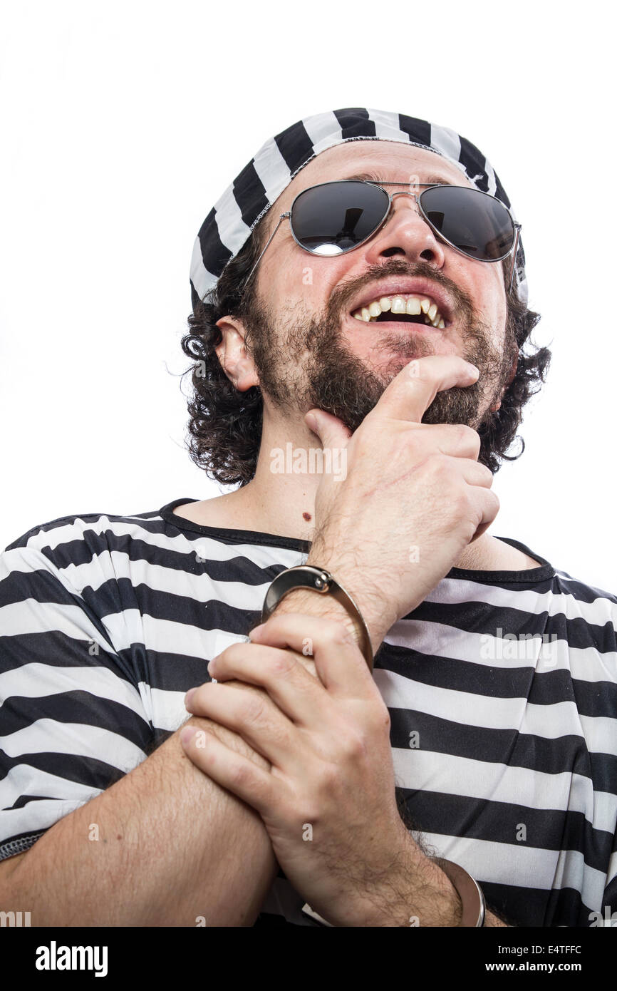 Jail, Desperate, portrait of a man prisoner in prison garb, over white ...