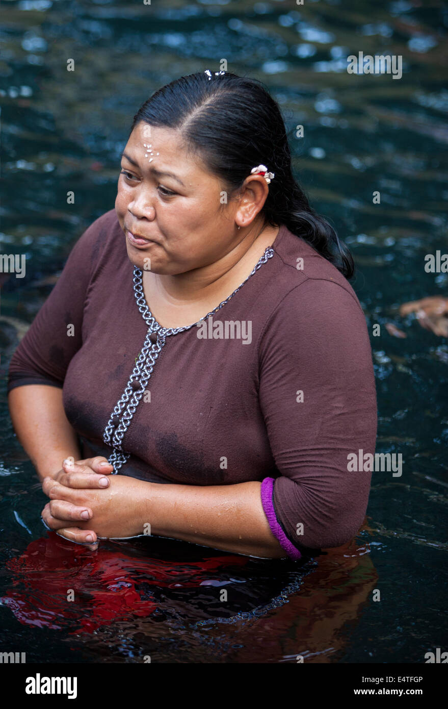 Bali, Indonesia. Woman Bathing at Tirta Empul, a Spring Sacred to ...