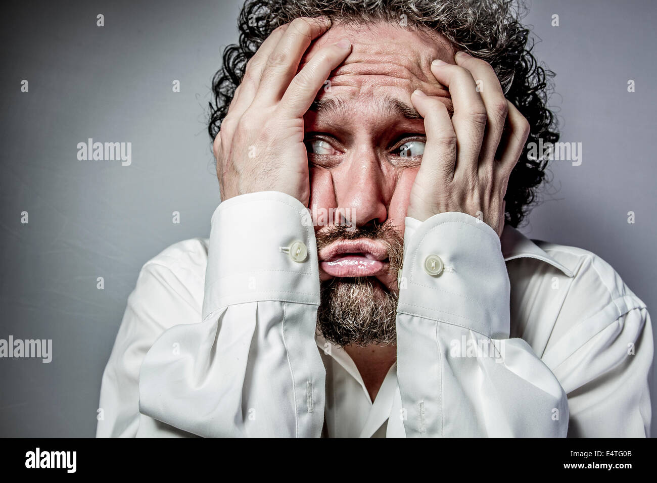 imagination and madness, man with intense expression, white shirt Stock ...