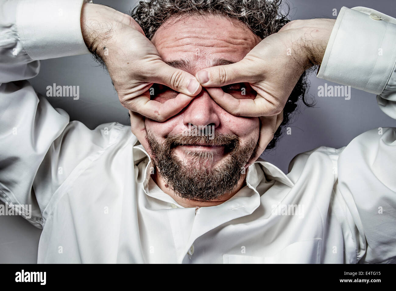 imagination and madness, man with intense expression, white shirt Stock ...