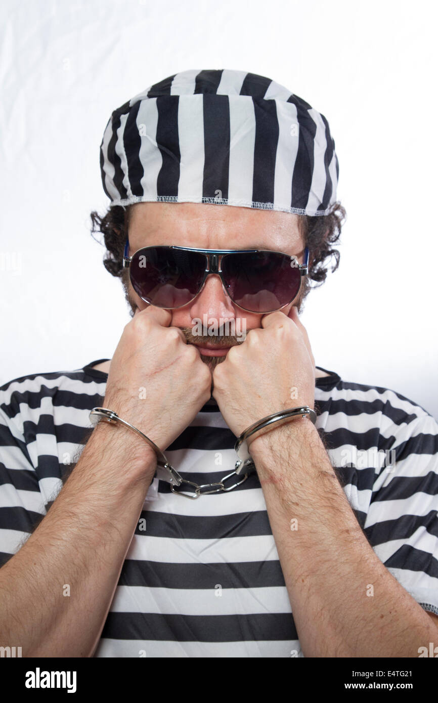 Penitentiary, Desperate, portrait of a man prisoner in prison garb ...