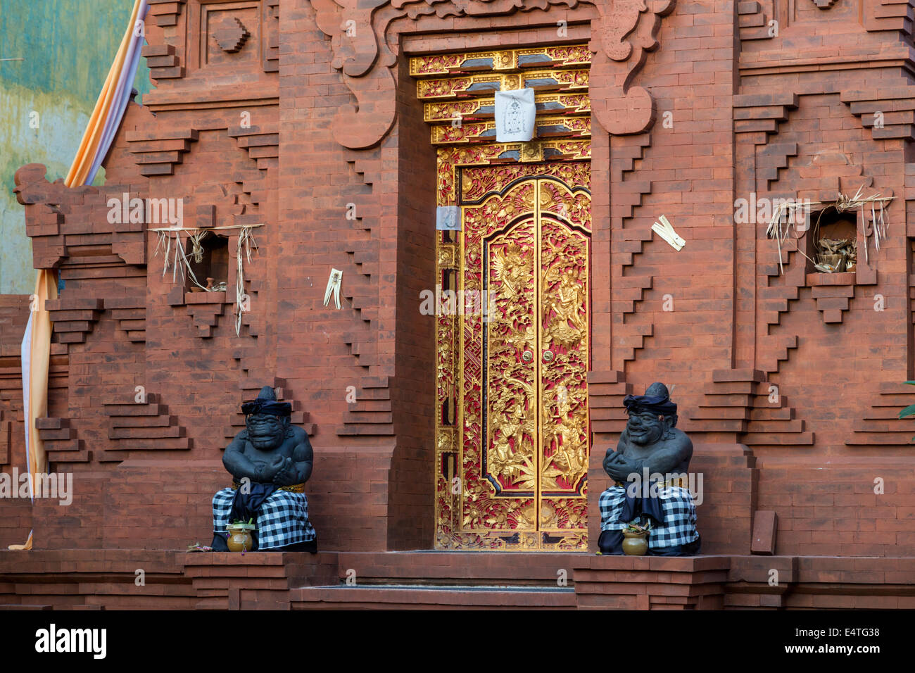 Jimbaran, Bali, Indonesia. Hindu Temple Guardian Wearing Saput Poleng ...