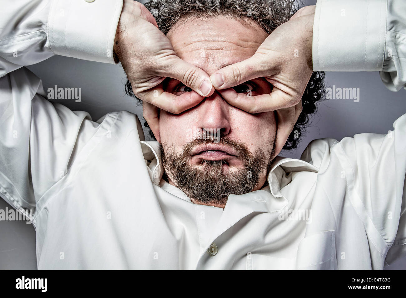 imagination and madness, man with intense expression, white shirt Stock ...