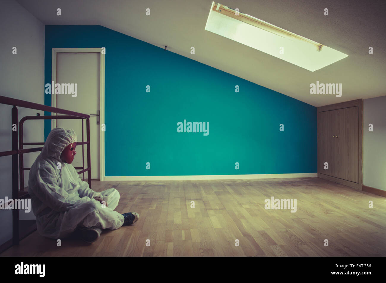 nightmare man with red mask in empty room Stock Photo - Alamy