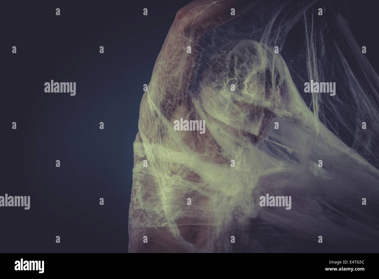 Man trapped in a spider web Stock Photo - Alamy