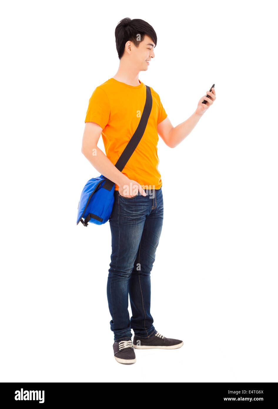 young student holding a smartphone with white background Stock Photo ...