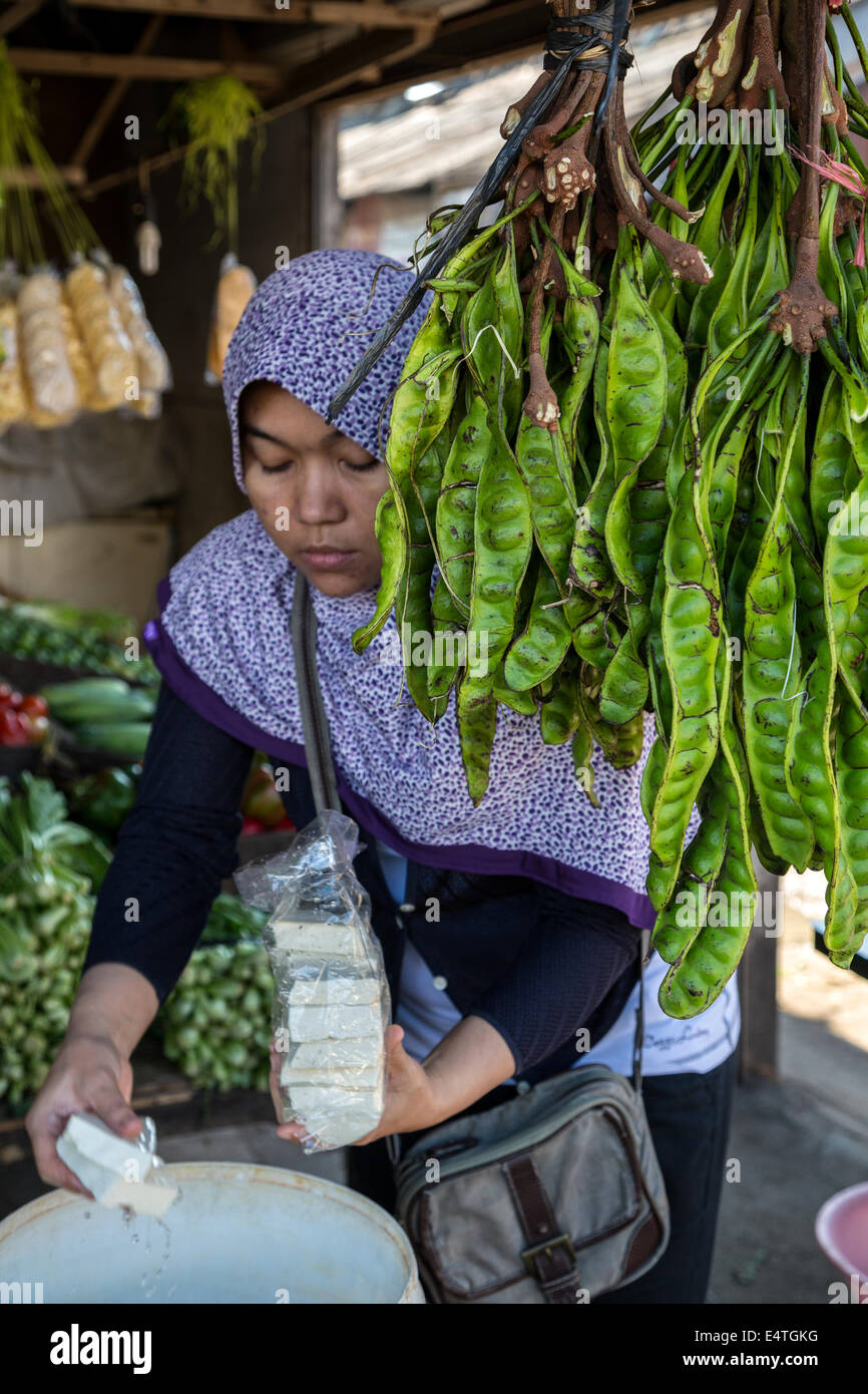 Jimbaran, Bali, Indonesia. Woman Buying Cheese next to Petai, or Pete ...