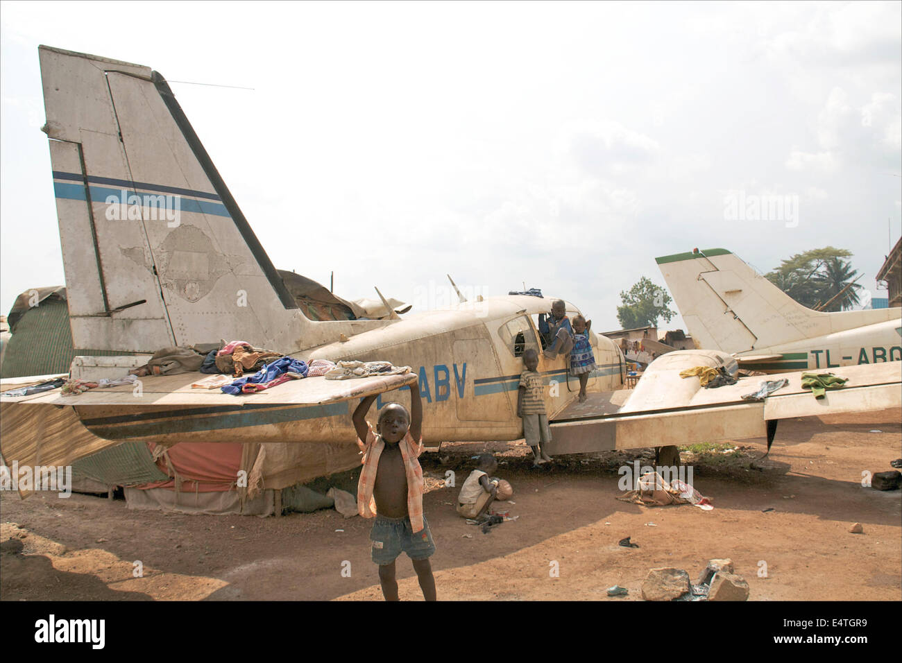 Refugee children play in an old plane at the M?Poko refugee camp at the ...