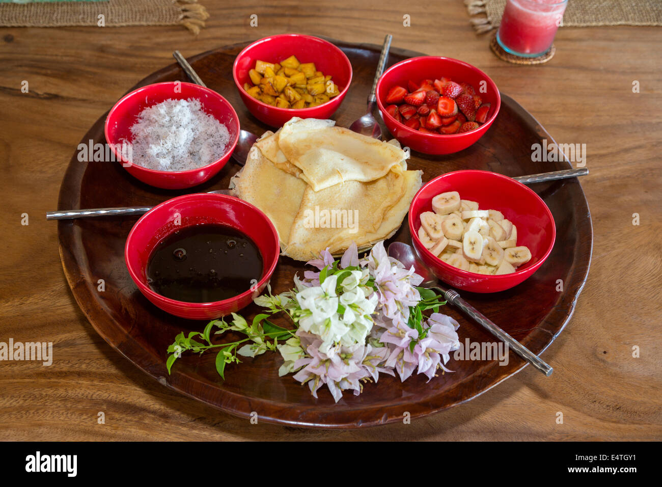 Jimbaran, Bali, Indonesia. Breakfast of Crepes, coconut, strawberries ...